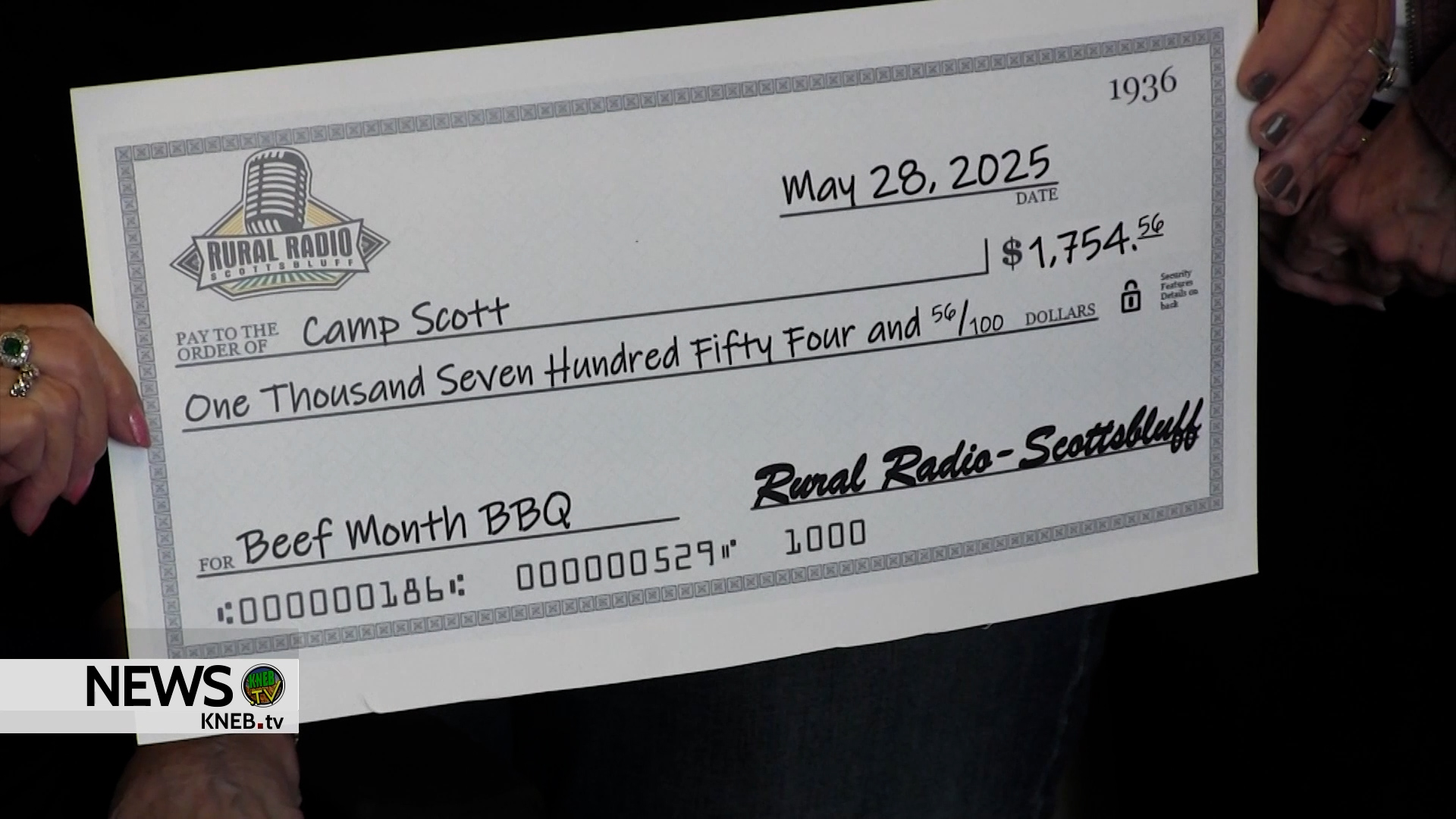 KNEB Donates More than $1,700 to Camp Scott from Beef Month BBQ