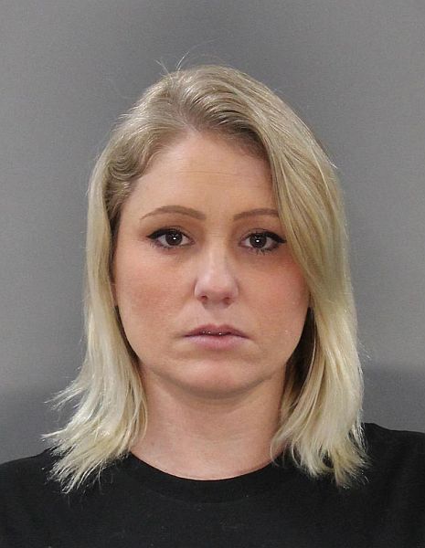 Kearney woman held on Arson and Child Abuse charges - KOOL