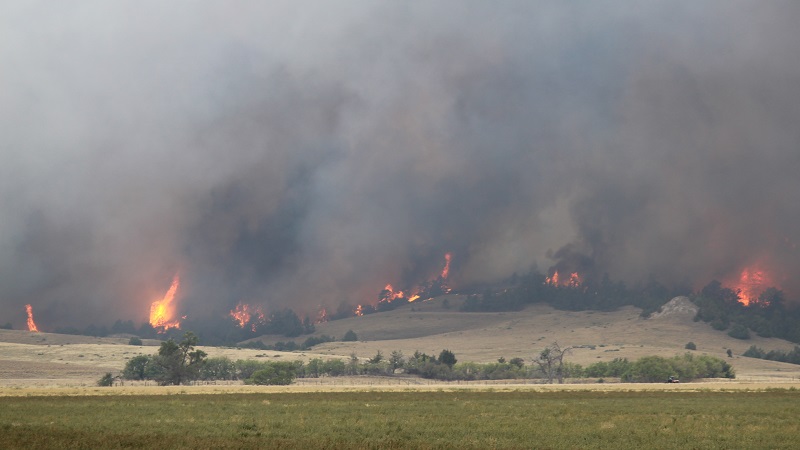 Firefighters Battling Wildfire in Hills South of Melbeta and McGrew