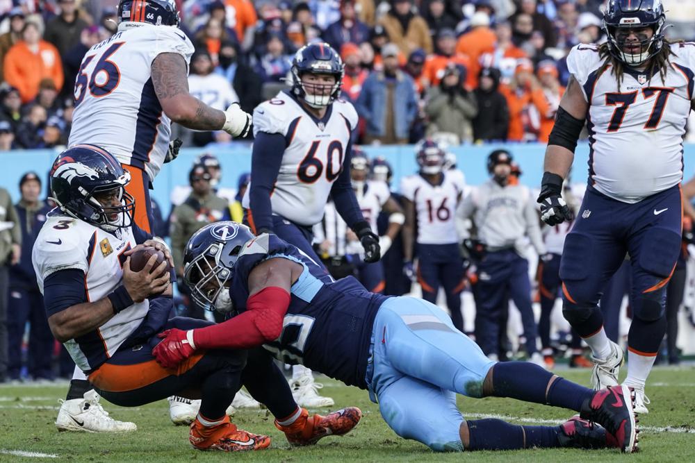 Wilson sacked 6 times, picked off late as Denver loses again - KOZY